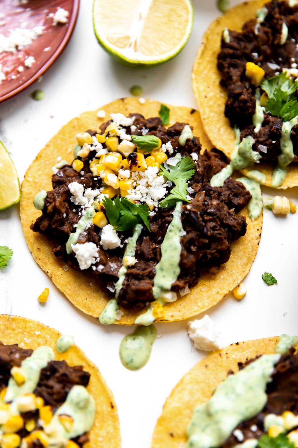 Black Bean Tostadas with Charred Corn & Avocado Crema | PWWB